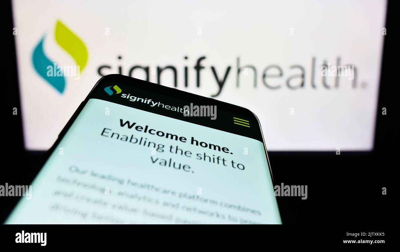 Mobile phone with website of US healthcare company Signify Health Inc ...