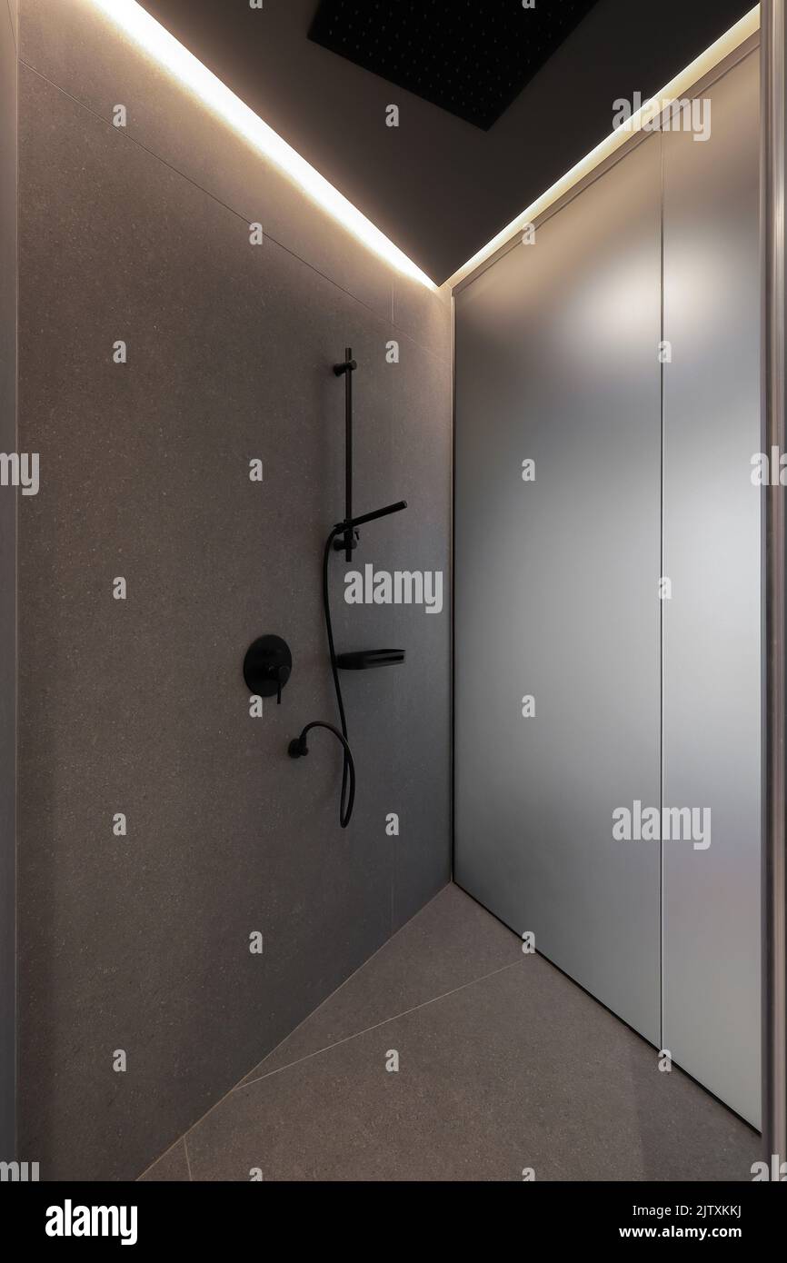 Modern shower in the shower room interior Stock Photo - Alamy