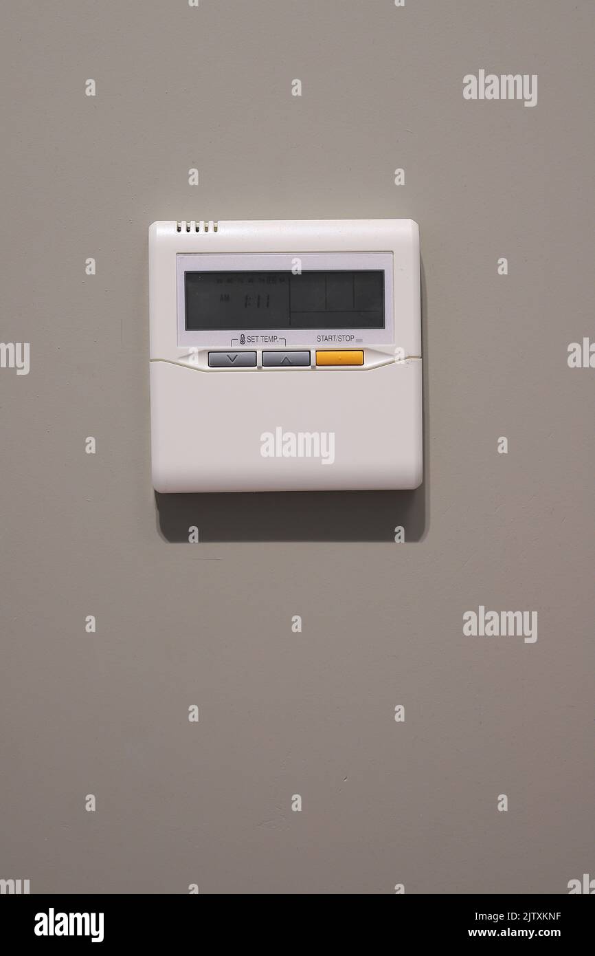 Air conditioning control panel on the wall close-up Stock Photo - Alamy