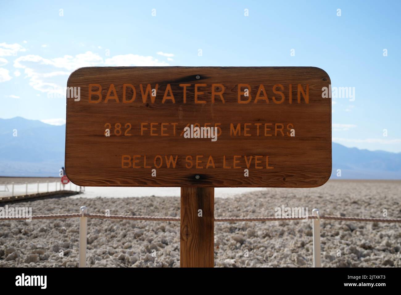 A 282 feet and 855m below Sea Level elevation sign at Badwater Basin ...