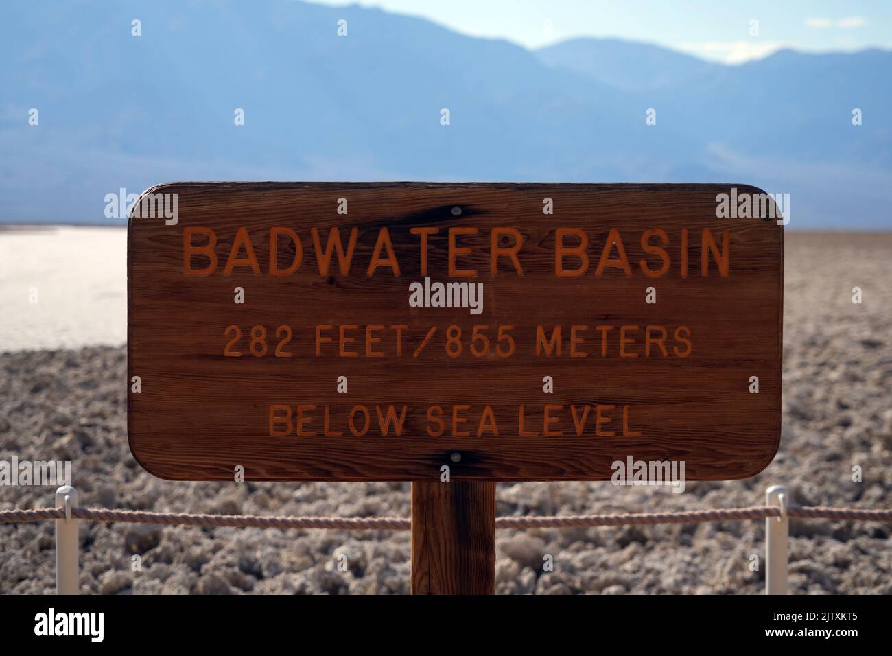 A 282 feet and 855m below Sea Level elevation sign at Badwater Basin ...