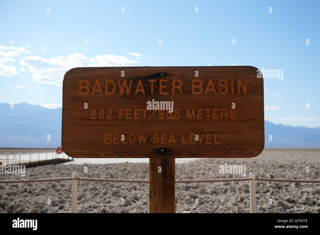 A 282 feet and 855m below Sea Level elevation sign at Badwater Basin ...