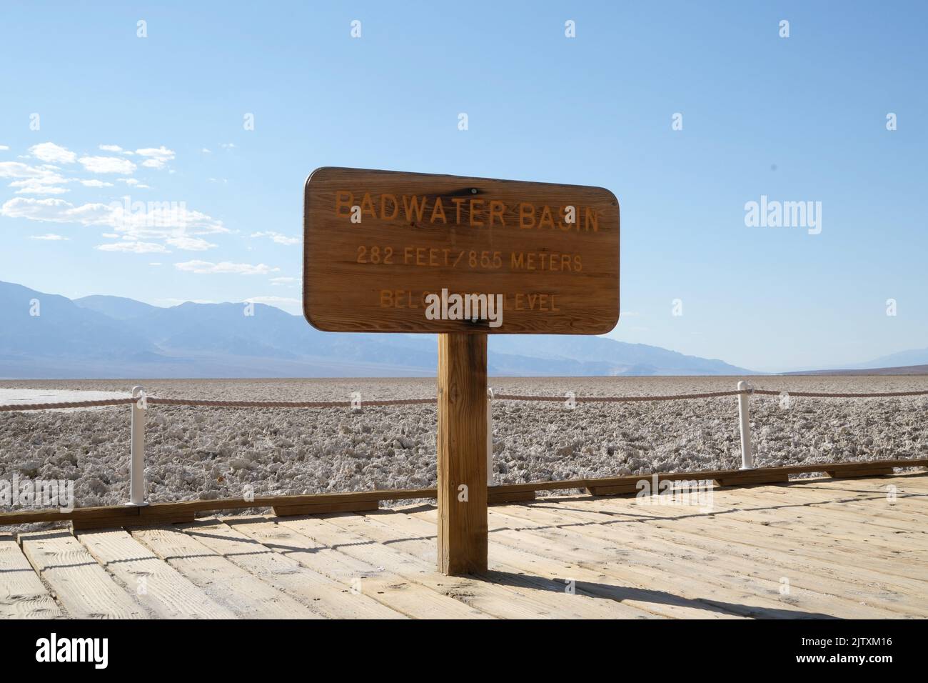 A 282 feet and 855m below Sea Level elevation sign at Badwater Basin ...
