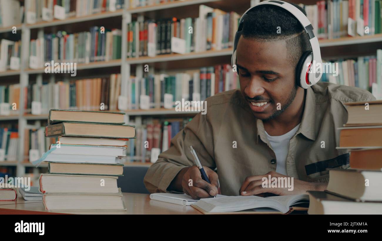 Teenager wearing headphones writing hi-res stock photography and images ...