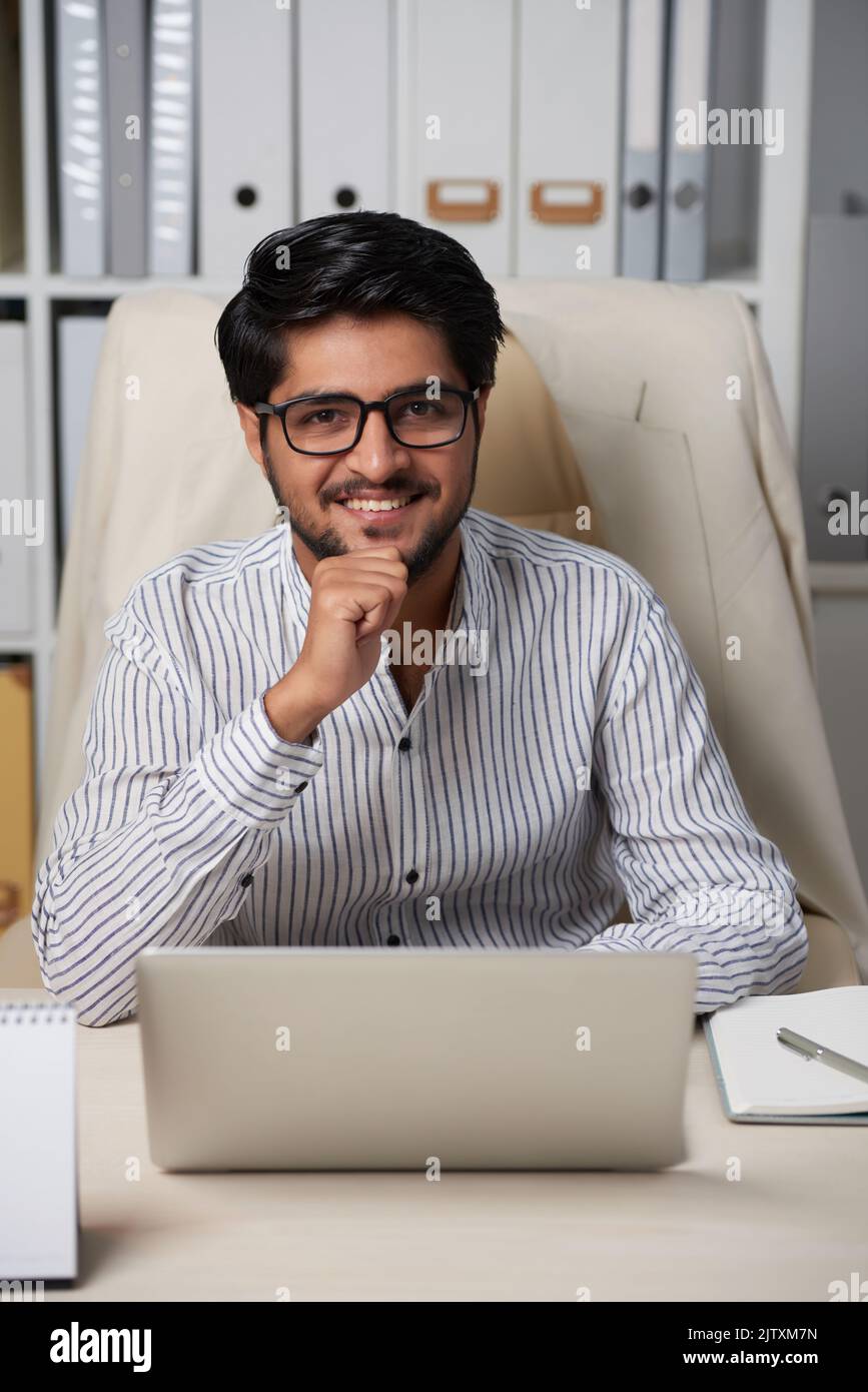Handsome indian business executive working hi-res stock photography and ...