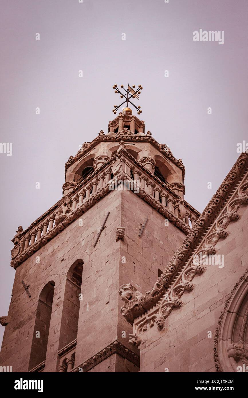 A vertical low-angle shot of the Cathedral of St. Mark. Korcula ...