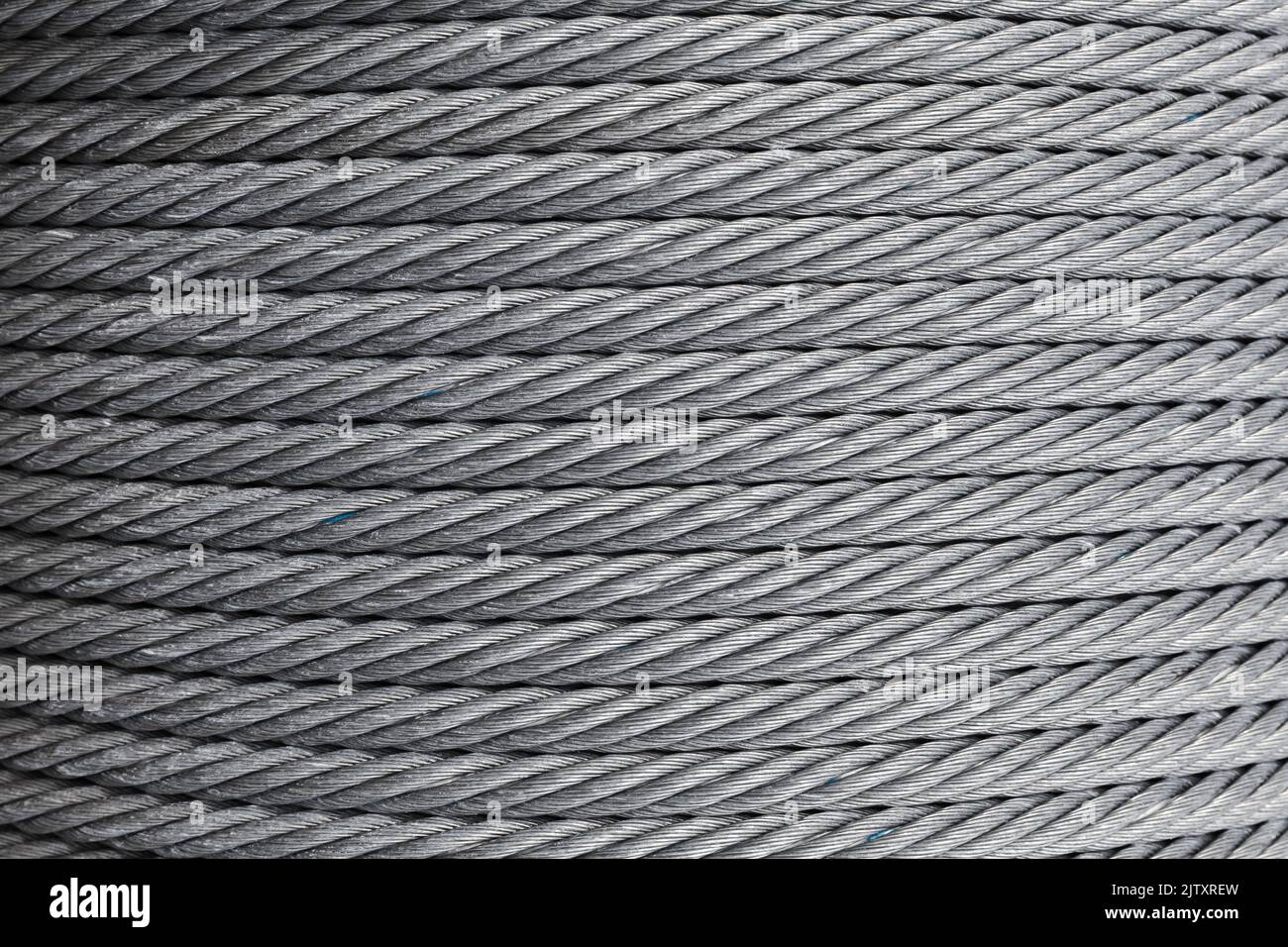 Steel rope is on a winch, abstract industrial background texture Stock ...