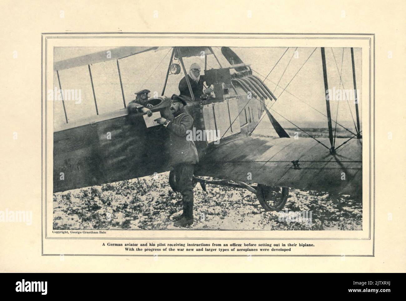 A German Aviator and his Pilot Receiving Instructions from an Officer ...