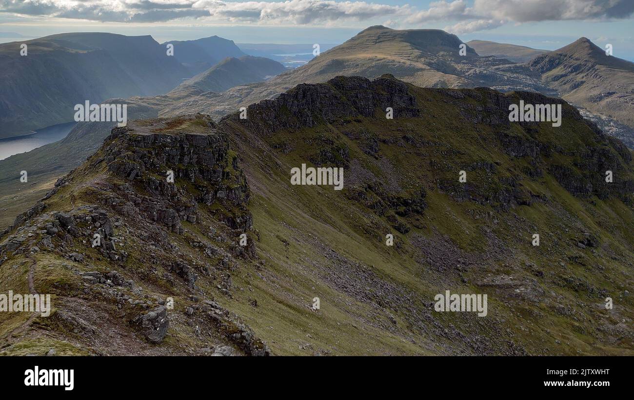 A Landscape of mountain range rocky peaks Stock Photo - Alamy