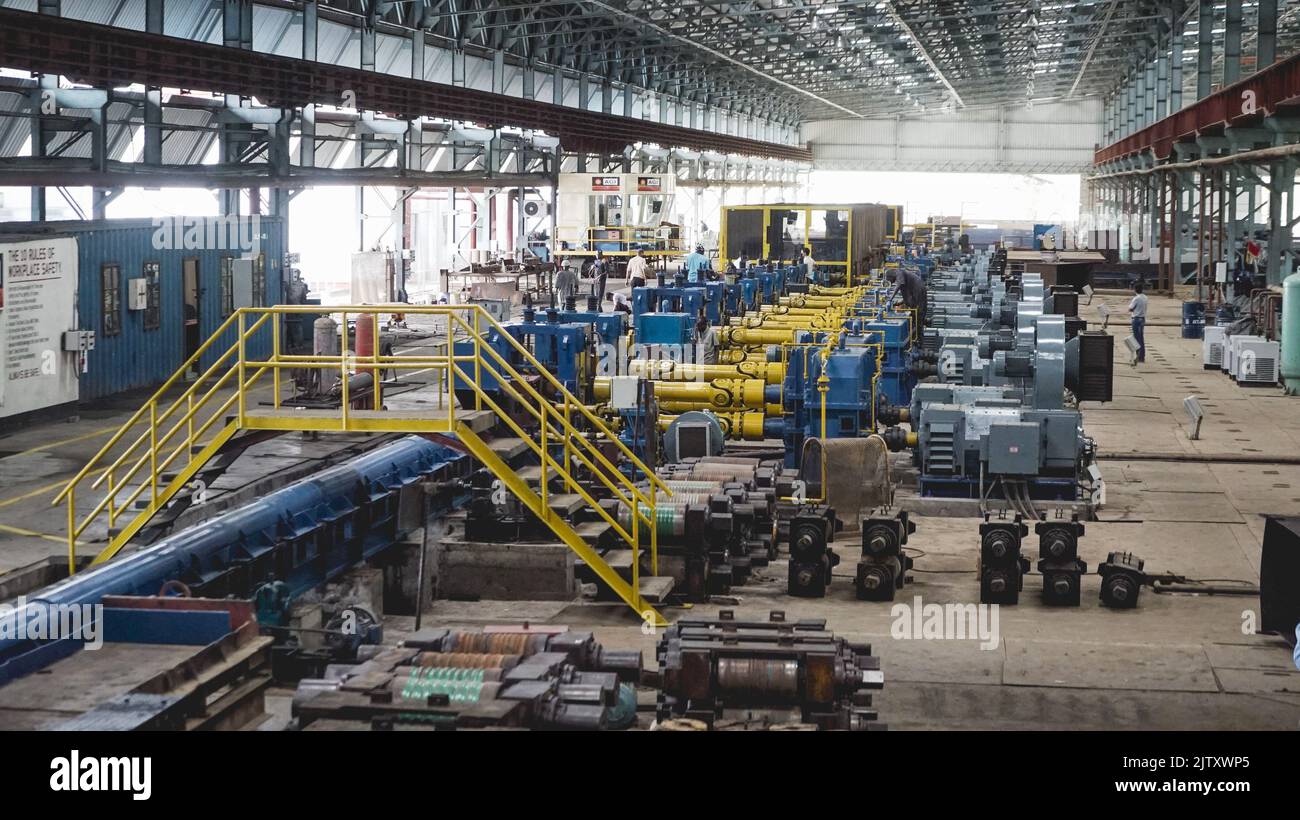 The inside of a factory full of machinery engines Stock Photo - Alamy