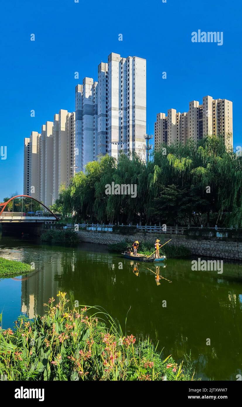 SUQIAN, CHINA - SEPTEMBER 2, 2022 - Sanitation workers salvage floating ...