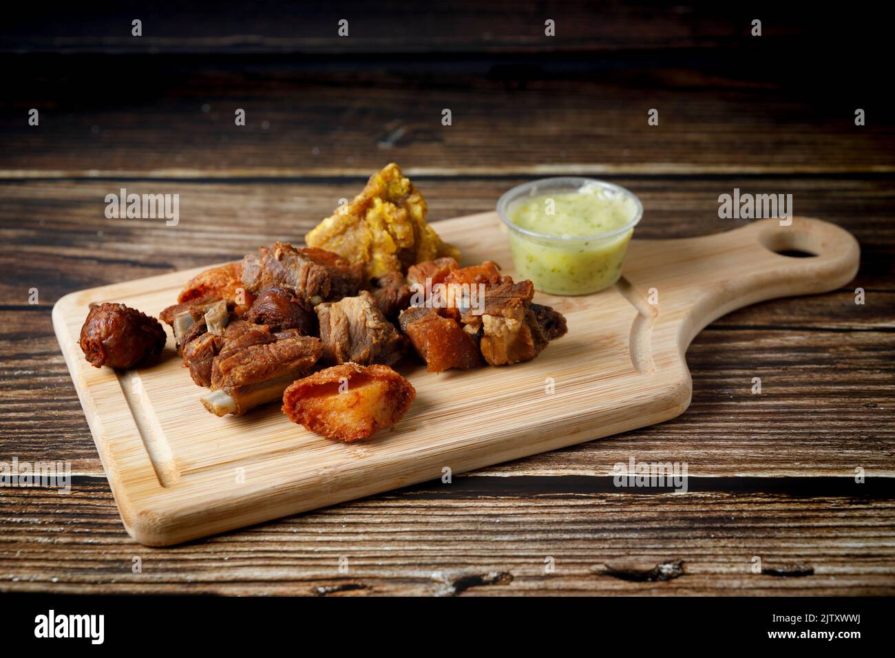 Traditional Colombian food with fried meat and banana Stock Photo - Alamy