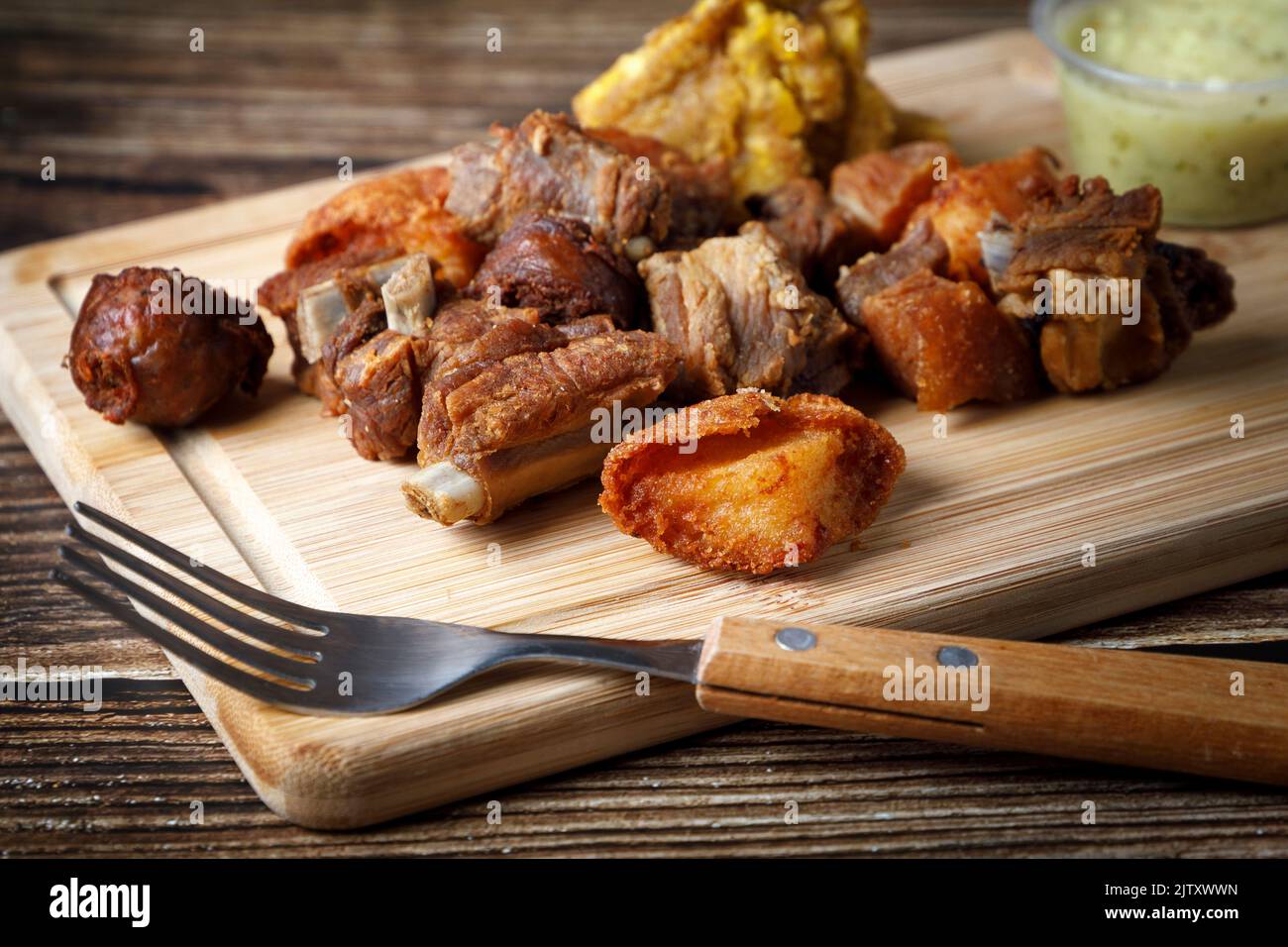 Traditional Colombian food with fried meat and banana Stock Photo - Alamy