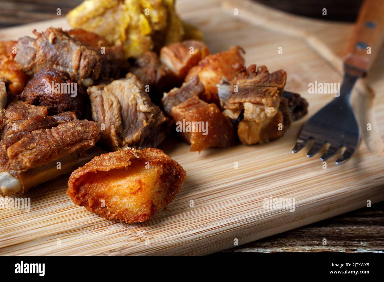 Traditional Colombian food with fried meat and banana Stock Photo - Alamy