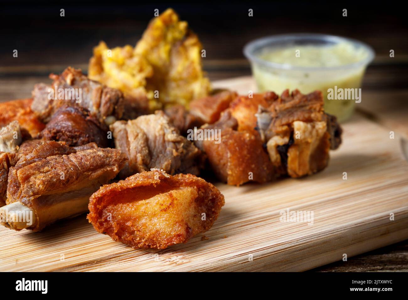Traditional Colombian food with fried meat and banana Stock Photo - Alamy