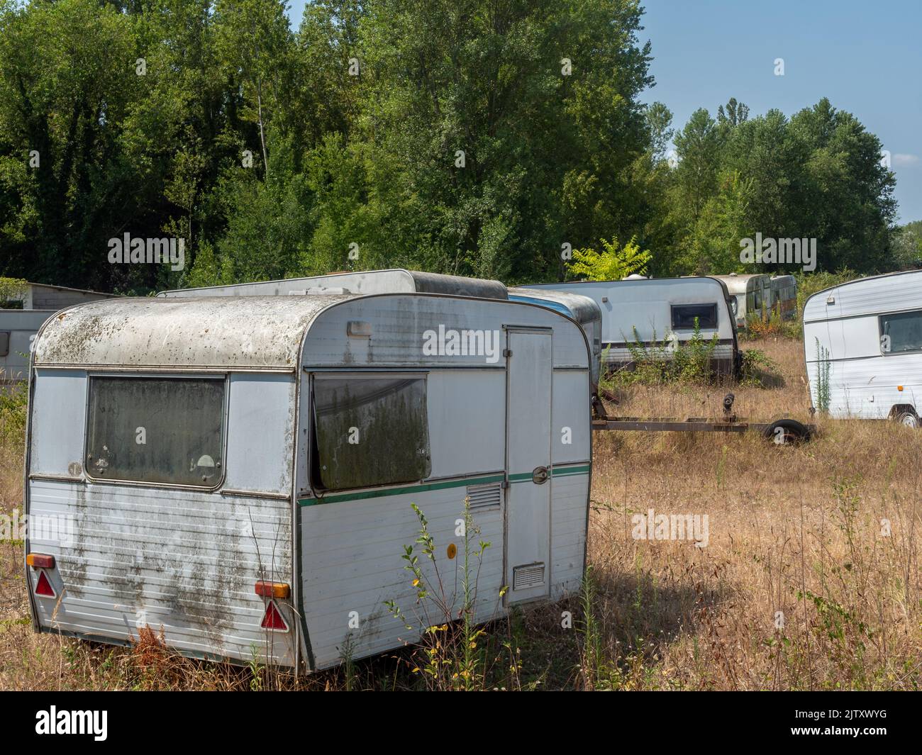 Old abandoned caravan village in Italy Stock Photo - Alamy