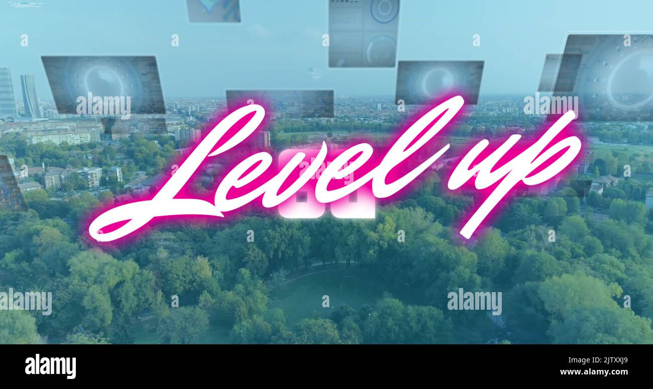 Image of level up text and data processing over cityscape Stock Photo ...