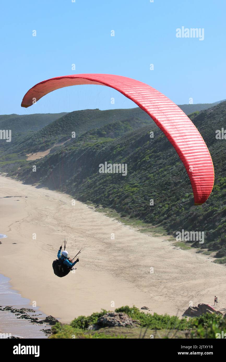 Paraglider flying in the air Stock Photo - Alamy