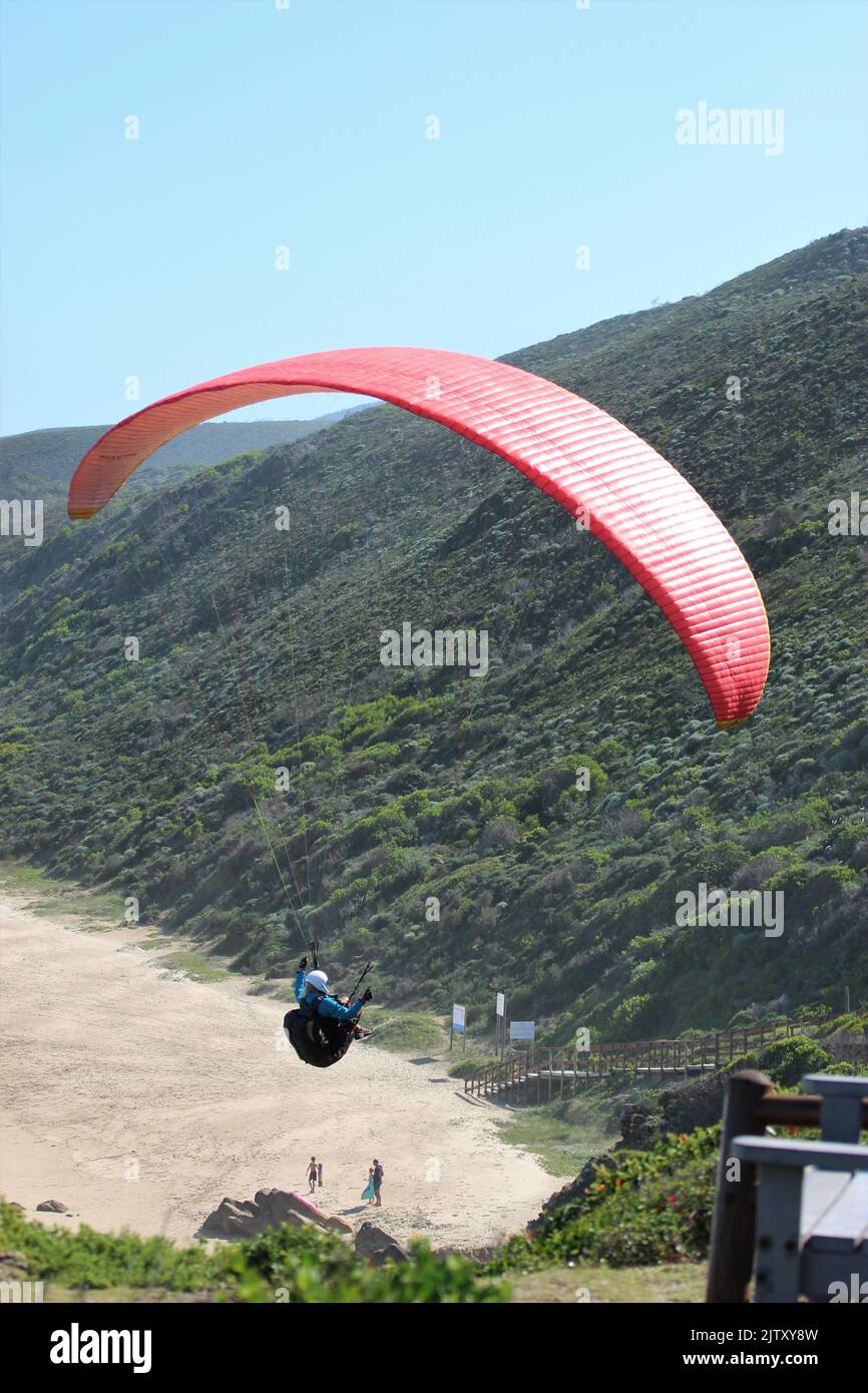 Paraglider flying in the air Stock Photo - Alamy