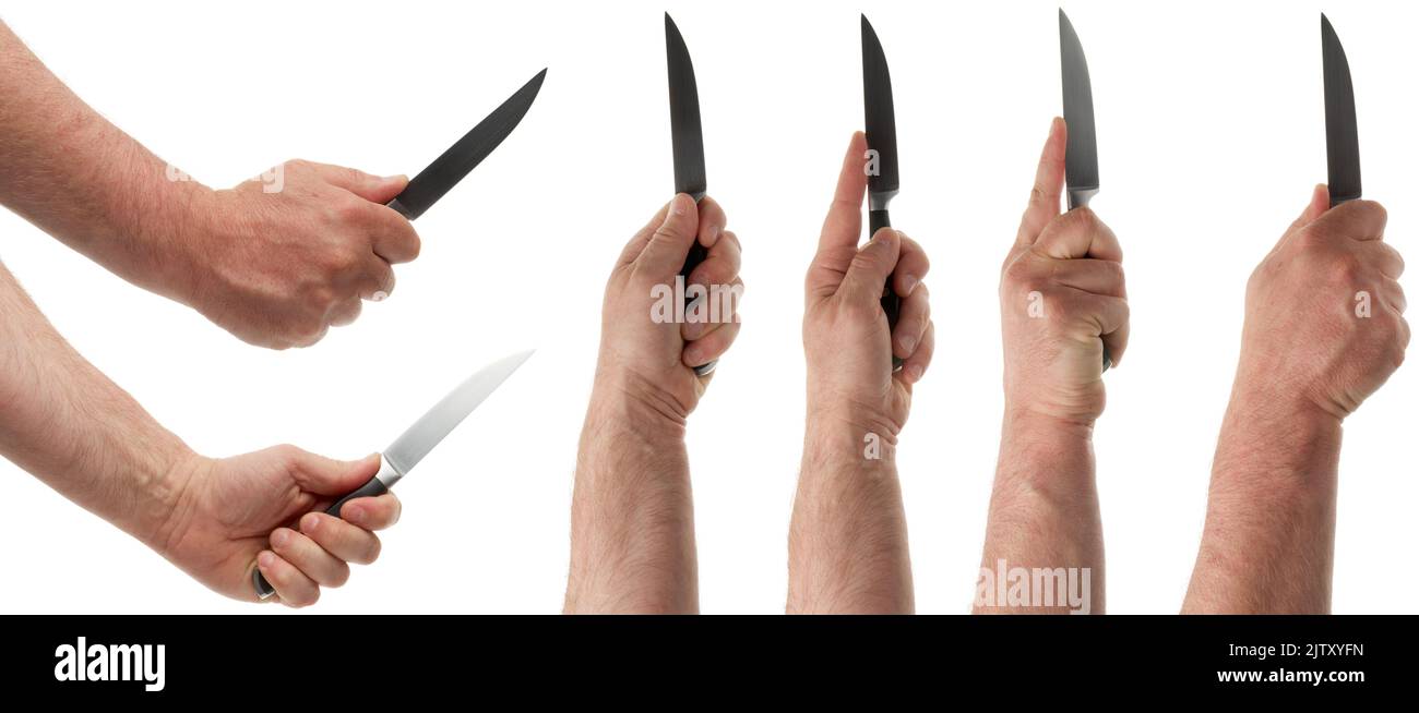 Close up of human hand with kitchen knife. Isolated on white background ...