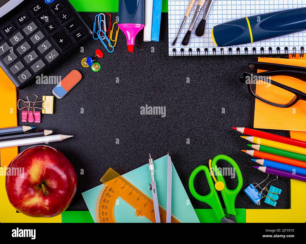 Soon to school, stationery on the background of a blackboard. copy ...