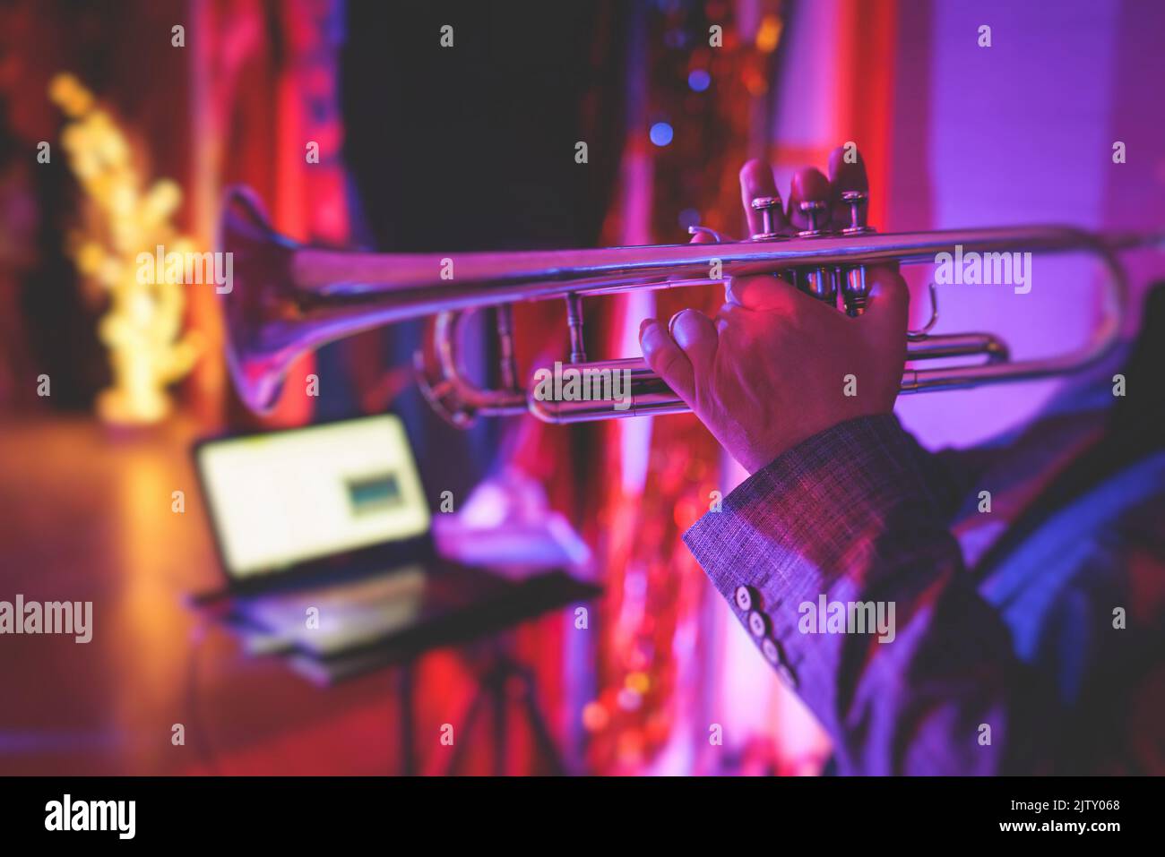 Concert view of a male trumpeter, professional trumpet player vocalist ...