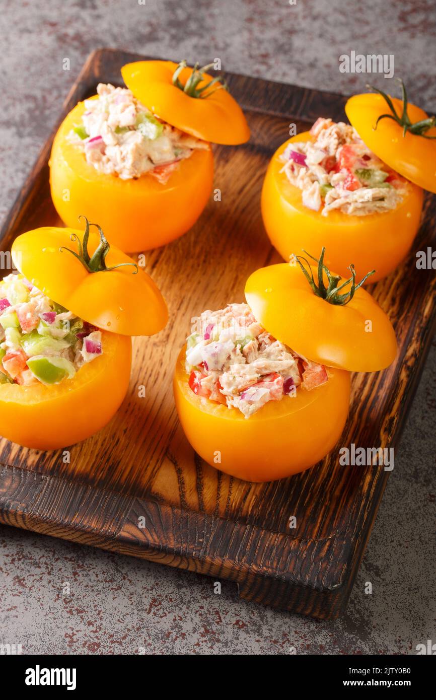 Traditional portuguese snack tomatoes stuffed with canned tuna and ...