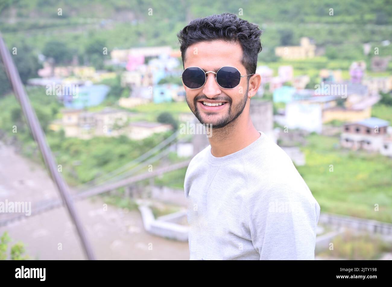 a indian boy happily, smiley face with sunglasses Stock Photo - Alamy