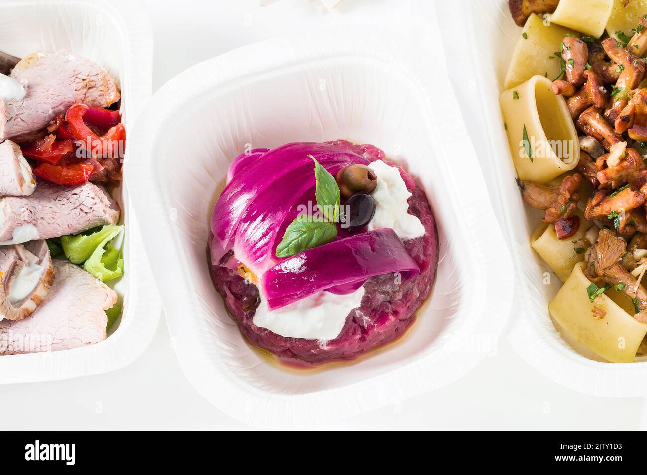 Collection of white plastic take away boxes with healthy food. Set of ...