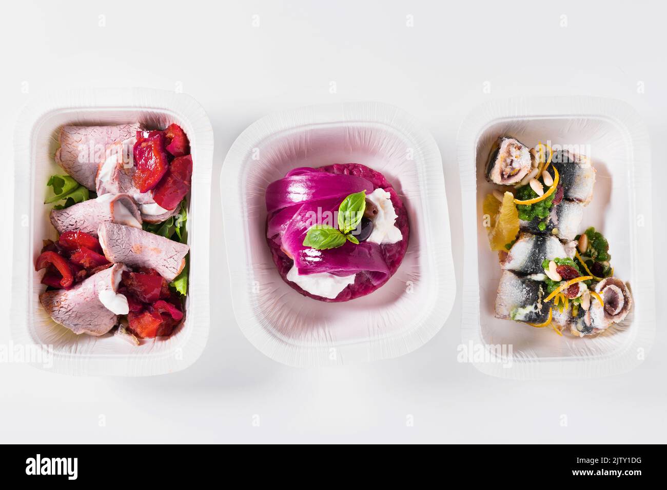 Collection of white plastic take away boxes with healthy food. Set of ...