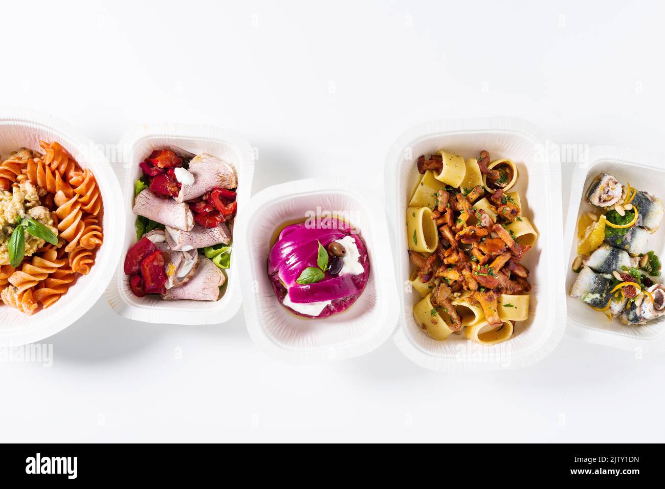 Collection of white plastic take away boxes with healthy food. Set of ...