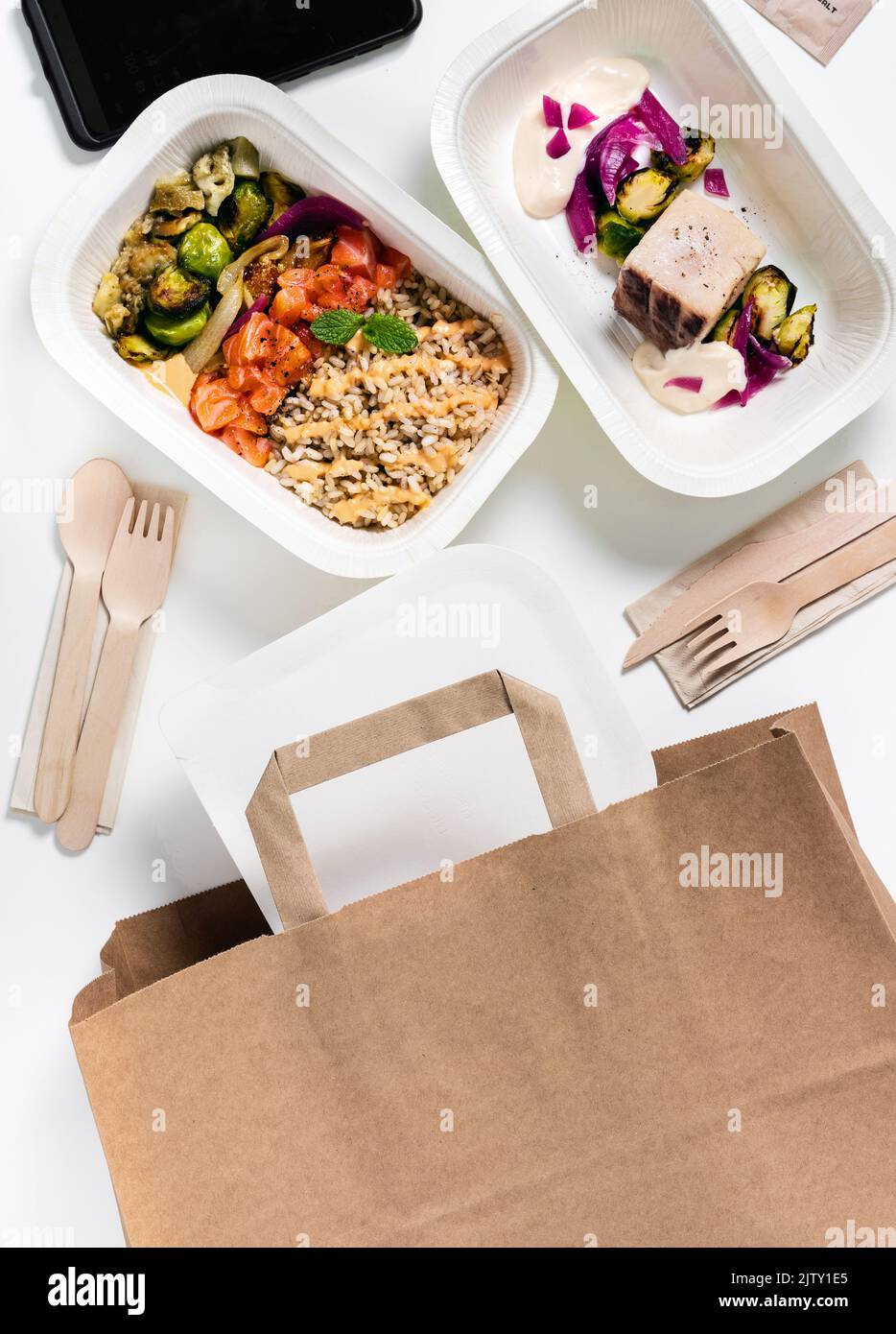 Collection of white plastic take away boxes with healthy food. Set of ...