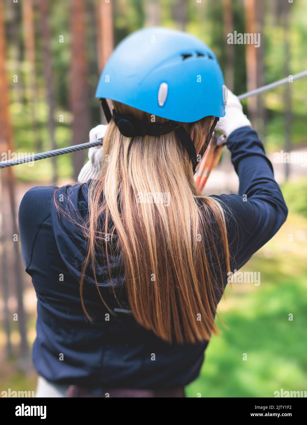 View of high ropes course, process of climbing in amusement acitivity ...