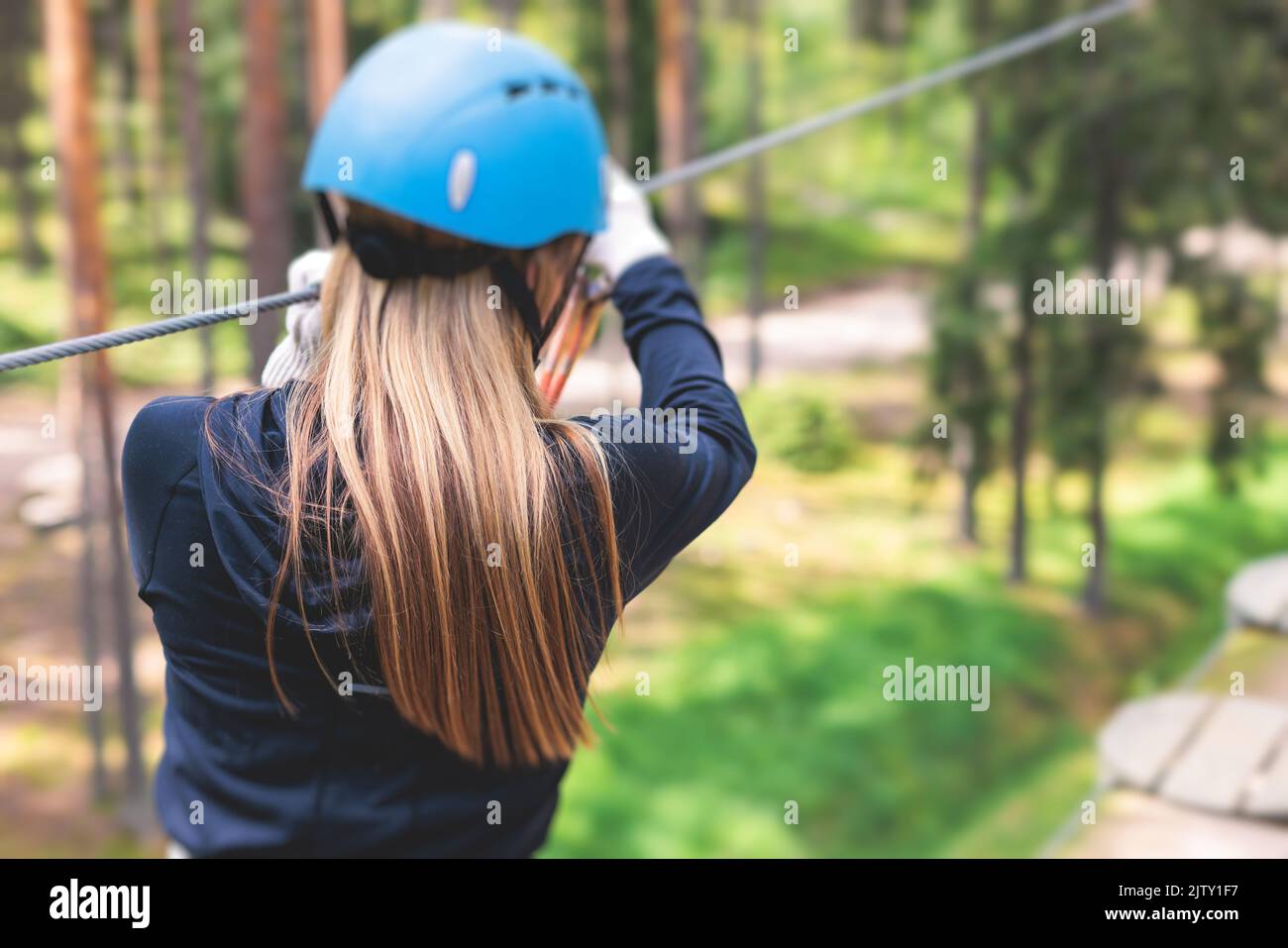 View of high ropes course, process of climbing in amusement acitivity ...