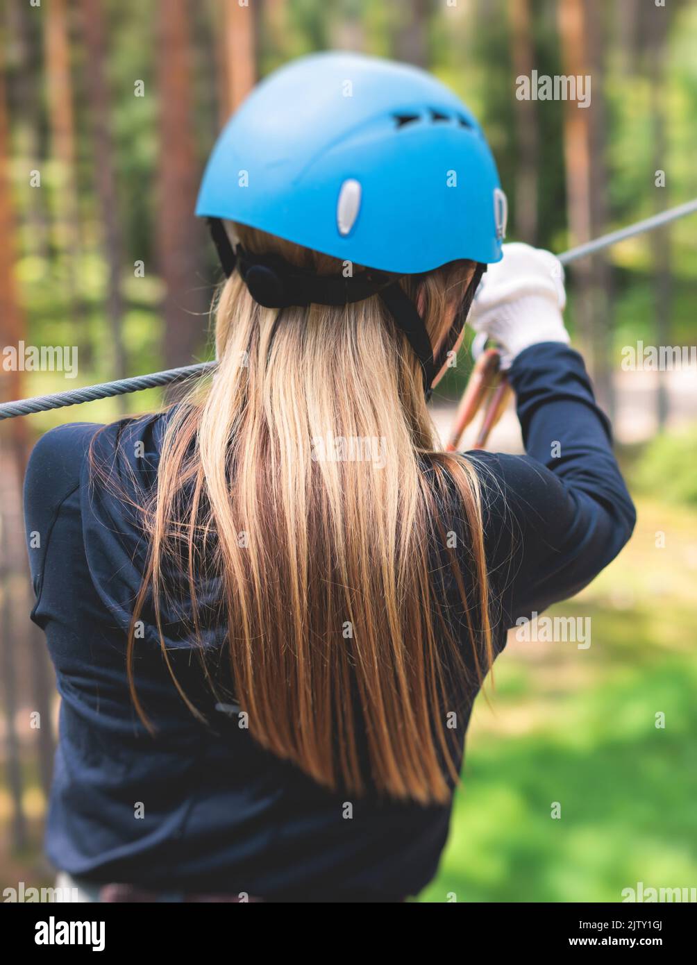 View of high ropes course, process of climbing in amusement acitivity ...