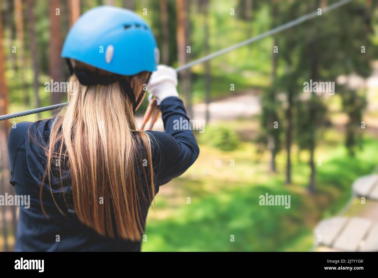 View of high ropes course, process of climbing in amusement acitivity ...