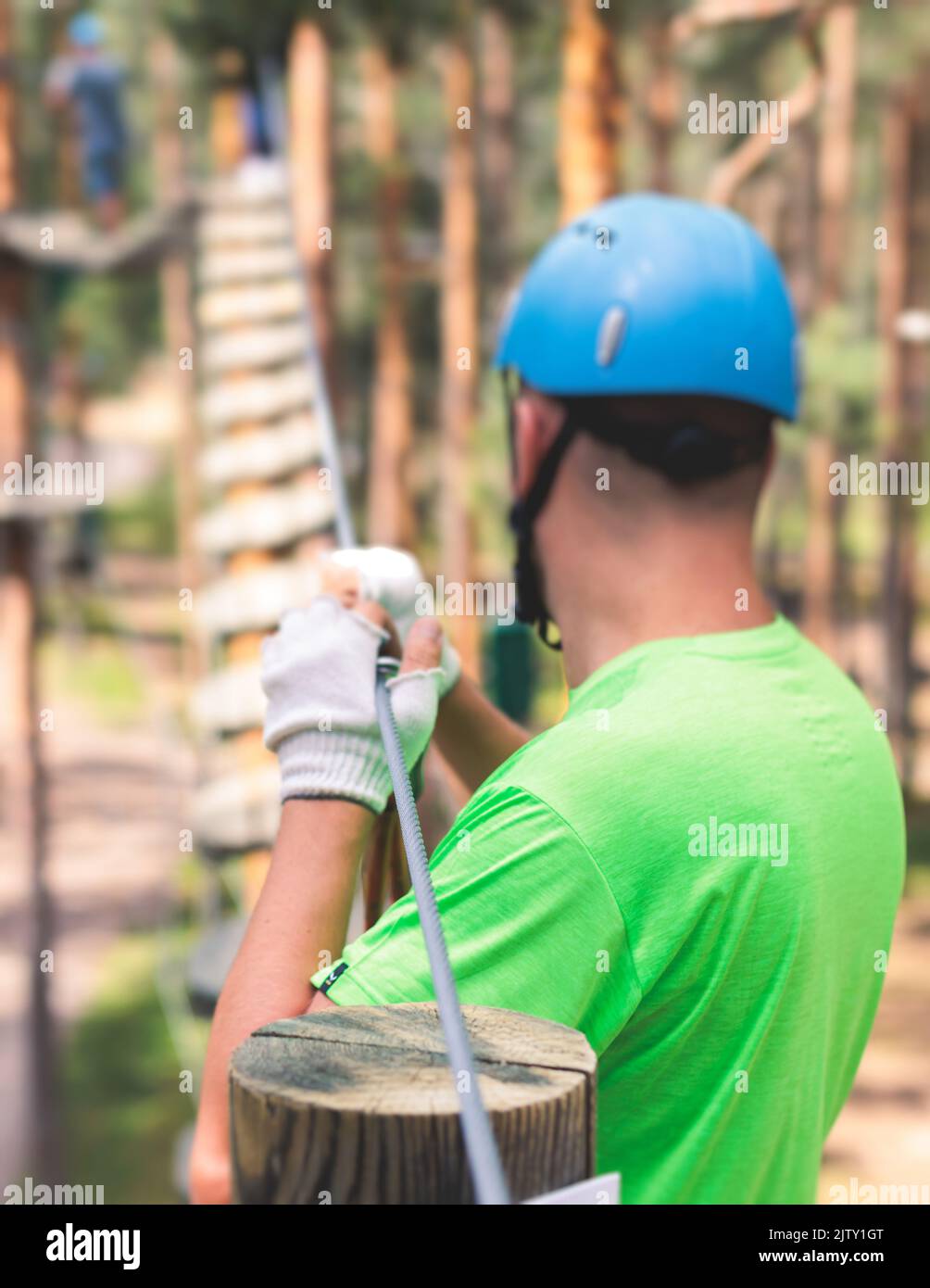 View of high ropes course, process of climbing in amusement acitivity ...
