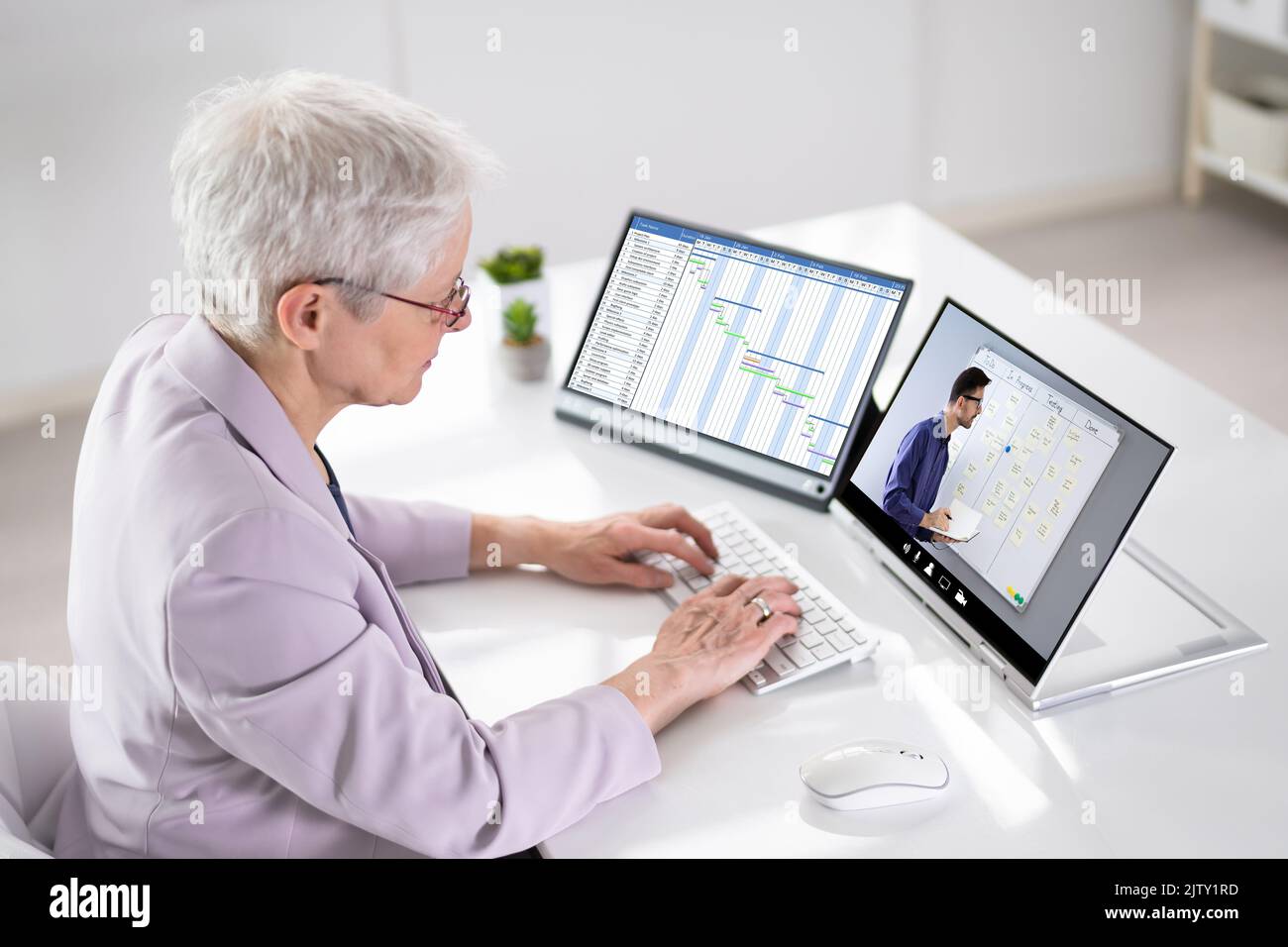 Virtual Online Training Program With Coach On Laptop Stock Photo - Alamy