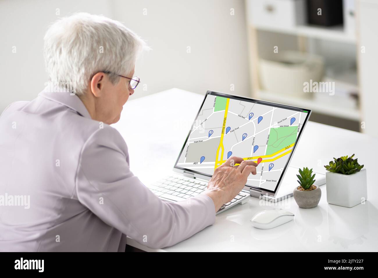 GPS Location Map Search Online On Laptop Stock Photo - Alamy