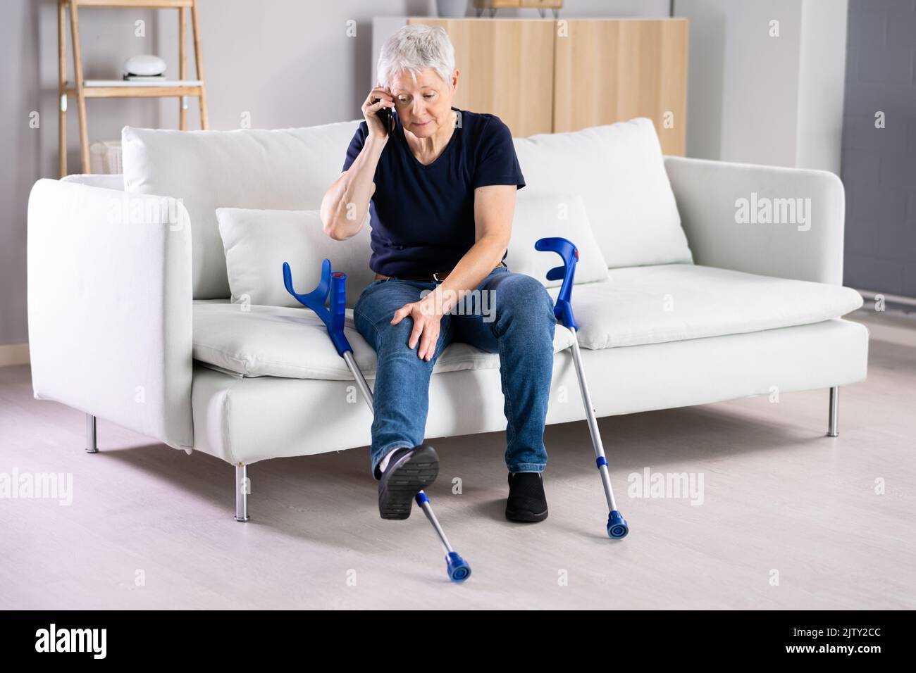 Senior patient use phone hi-res stock photography and images - Alamy