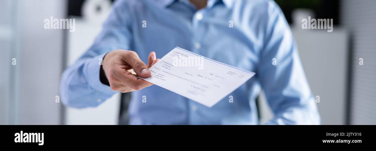 Executive Hand Giving Payment Check Or Compensation Cheque Stock Photo ...
