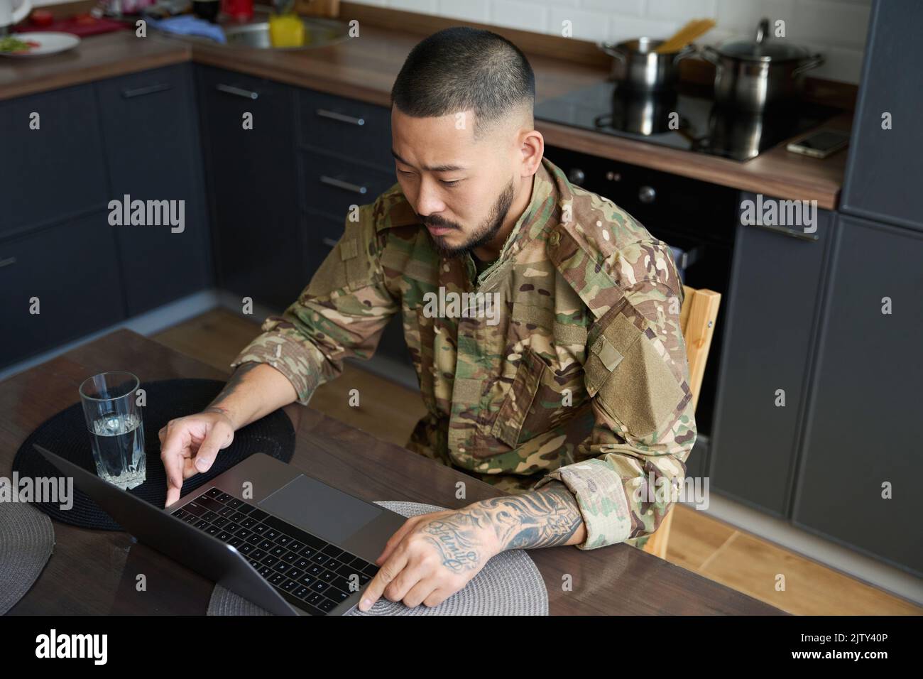 Military laptop online learning hi-res stock photography and images - Alamy