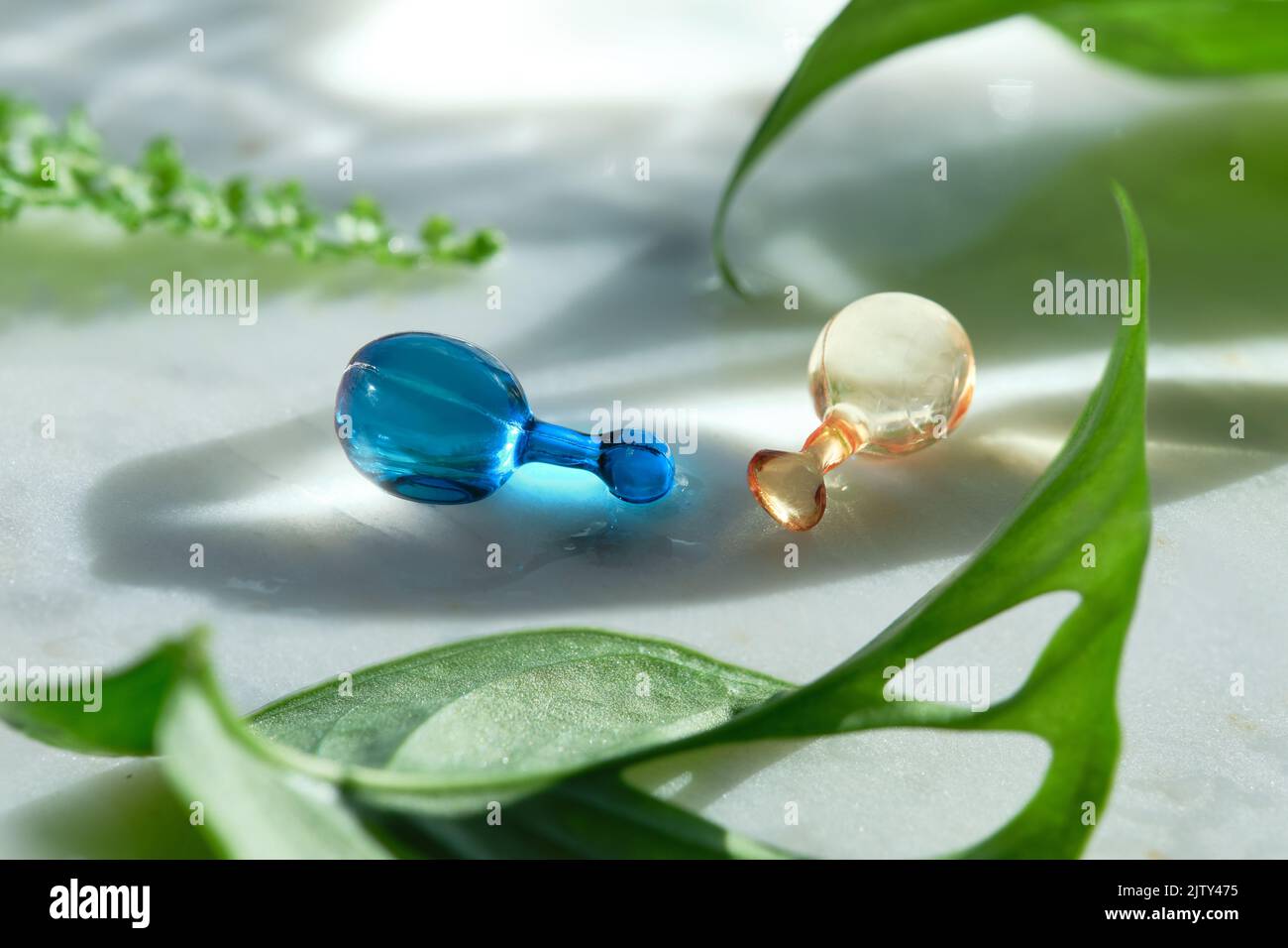 Serum capsules for healthy skin, blue and yellow. Anti-wrinkle ...