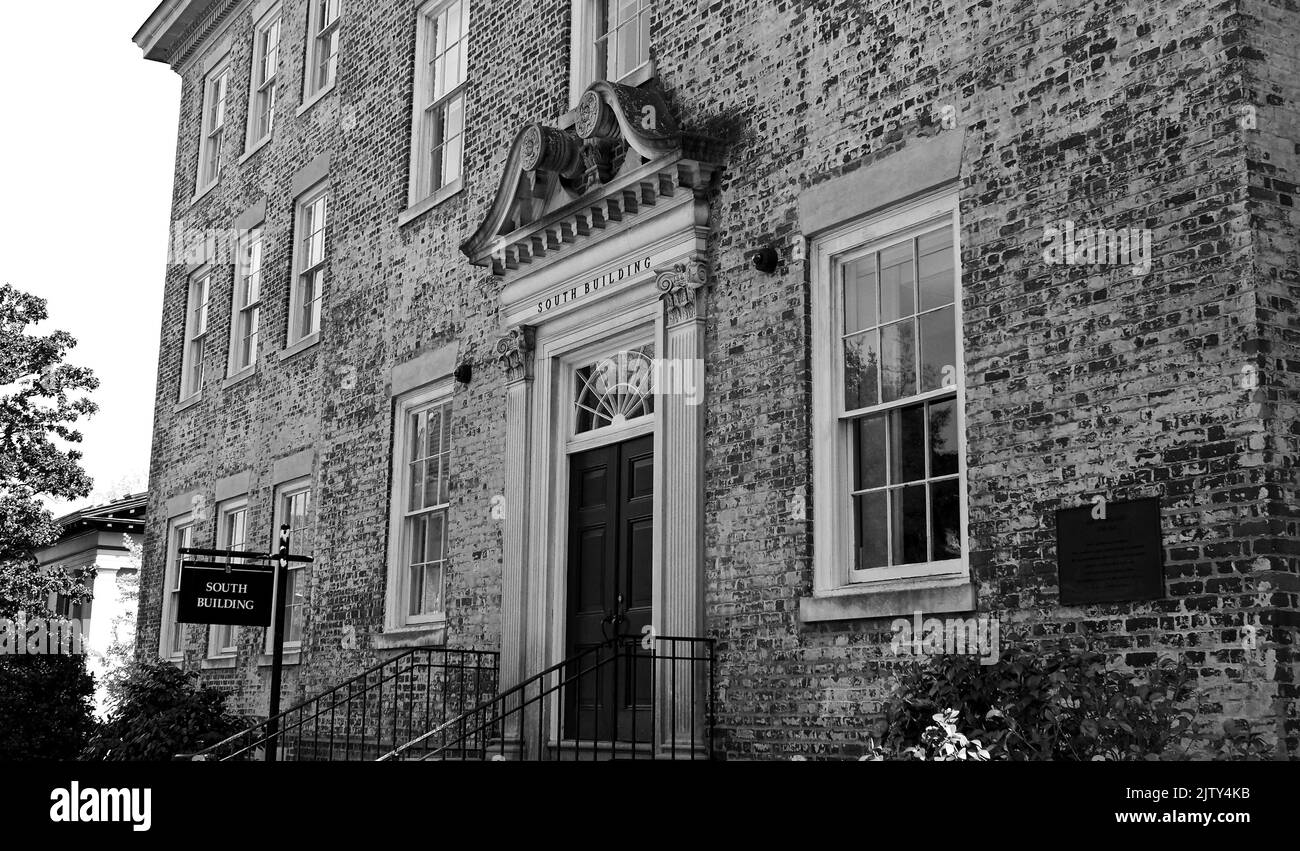 A closeup grayscale of a south building with a signboard on it Stock ...