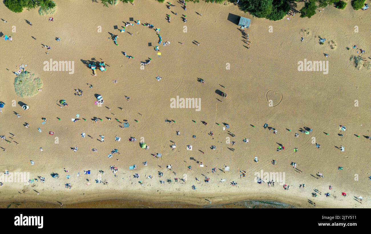 Drone view of the beach and people resting Stock Photo - Alamy