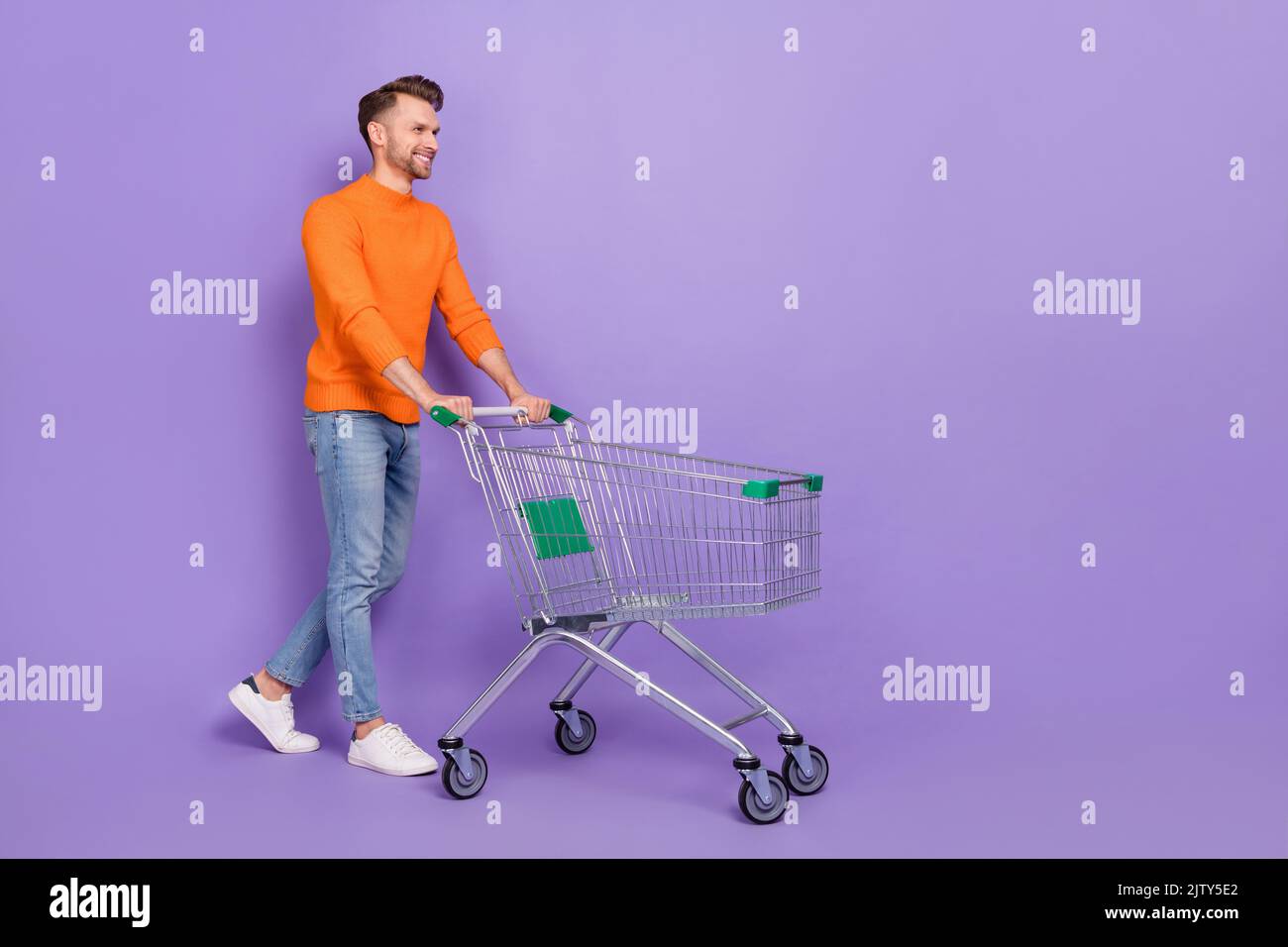 Full size photo of good mood shopaholic male go shopping in city center ...