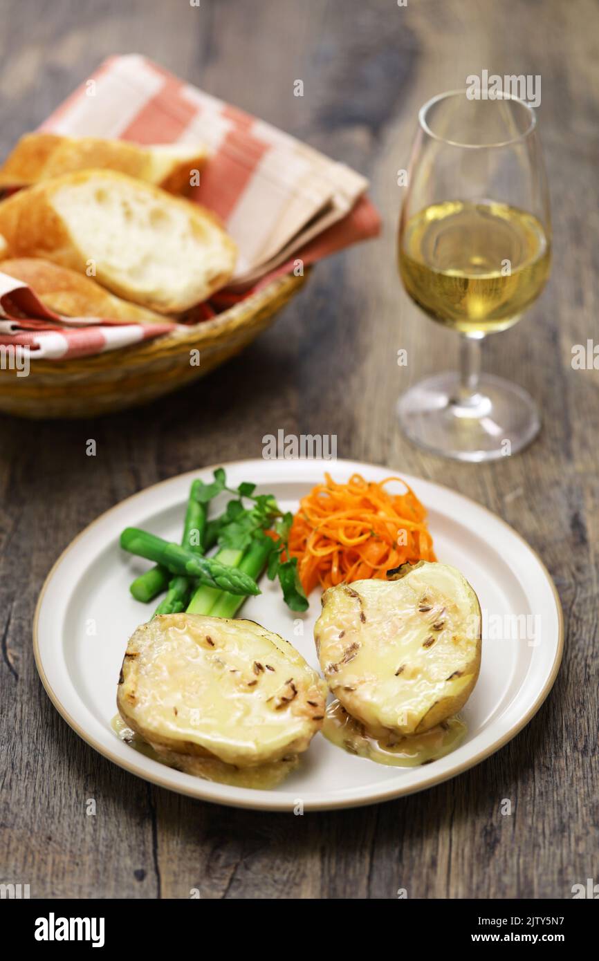 baked potatoes with Munster (washed rind cheese from Alsace, France ...