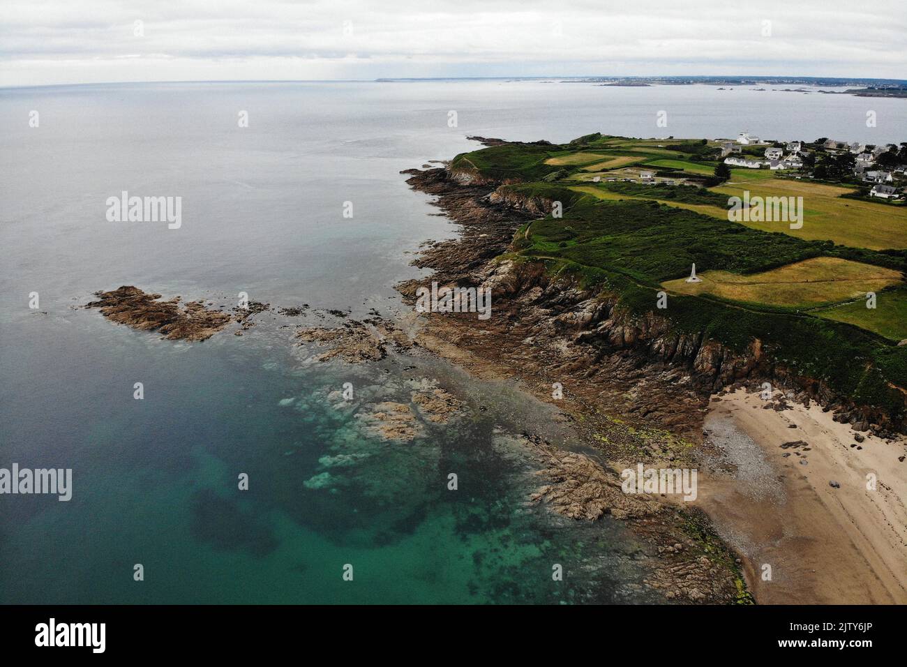 The beautiful landscape of Brittany in France, with green cliffs, trees ...