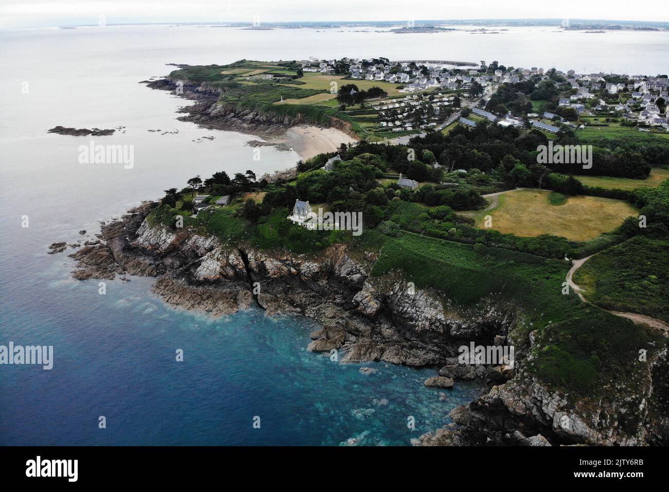 The beautiful landscape of Brittany in France, with green cliffs, trees ...