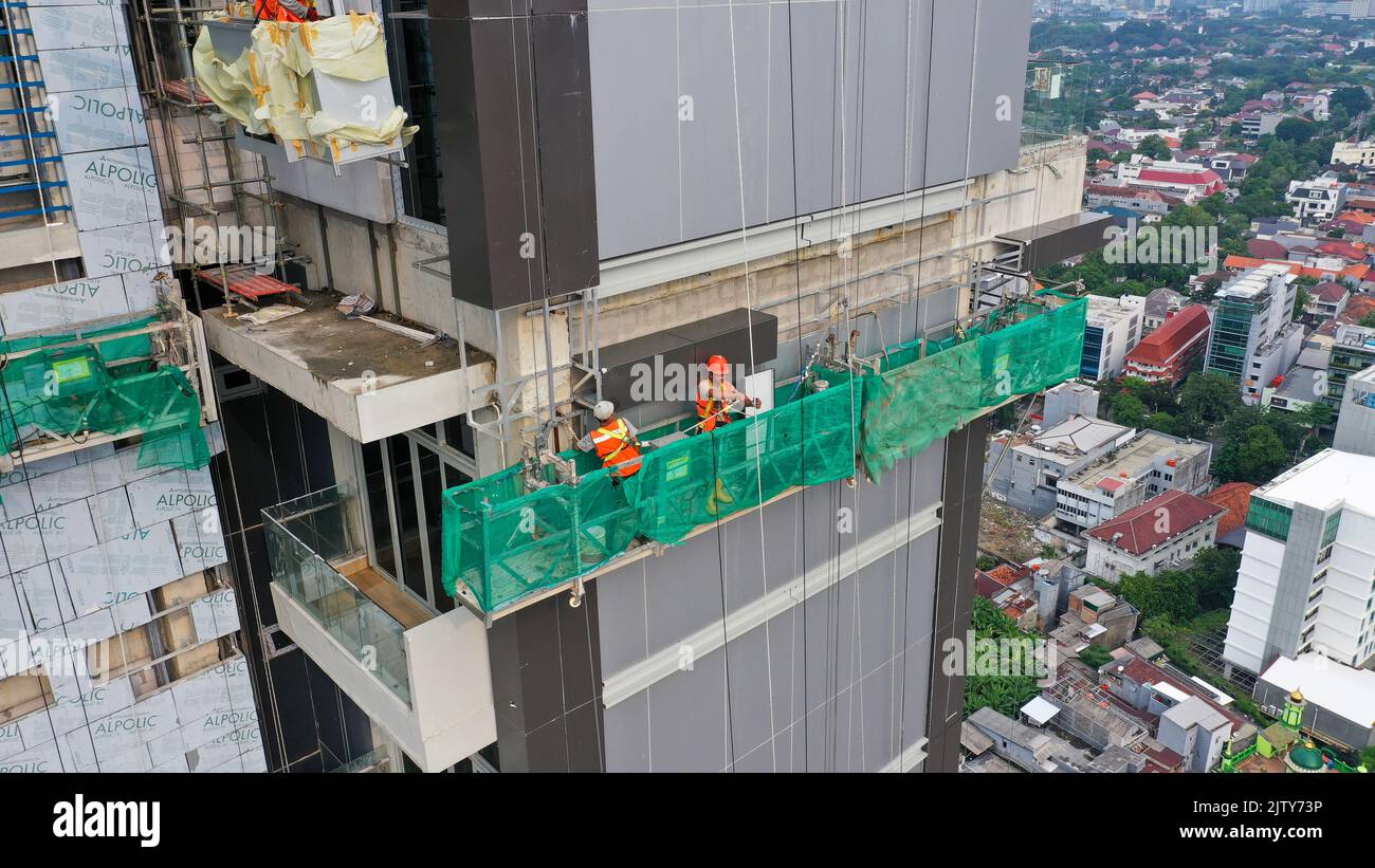 Suspended platform, construction cradle hanging on building ...